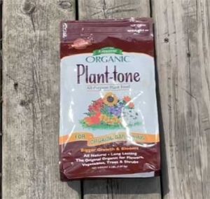 Holly-Tone Vs. Plant-Tone: Which Organic Fertilizer Wins For Your Garden?